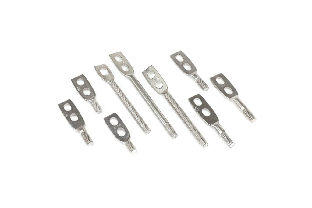 Metal turnbuckles with threaded rods and flat ends featuring two holes ...